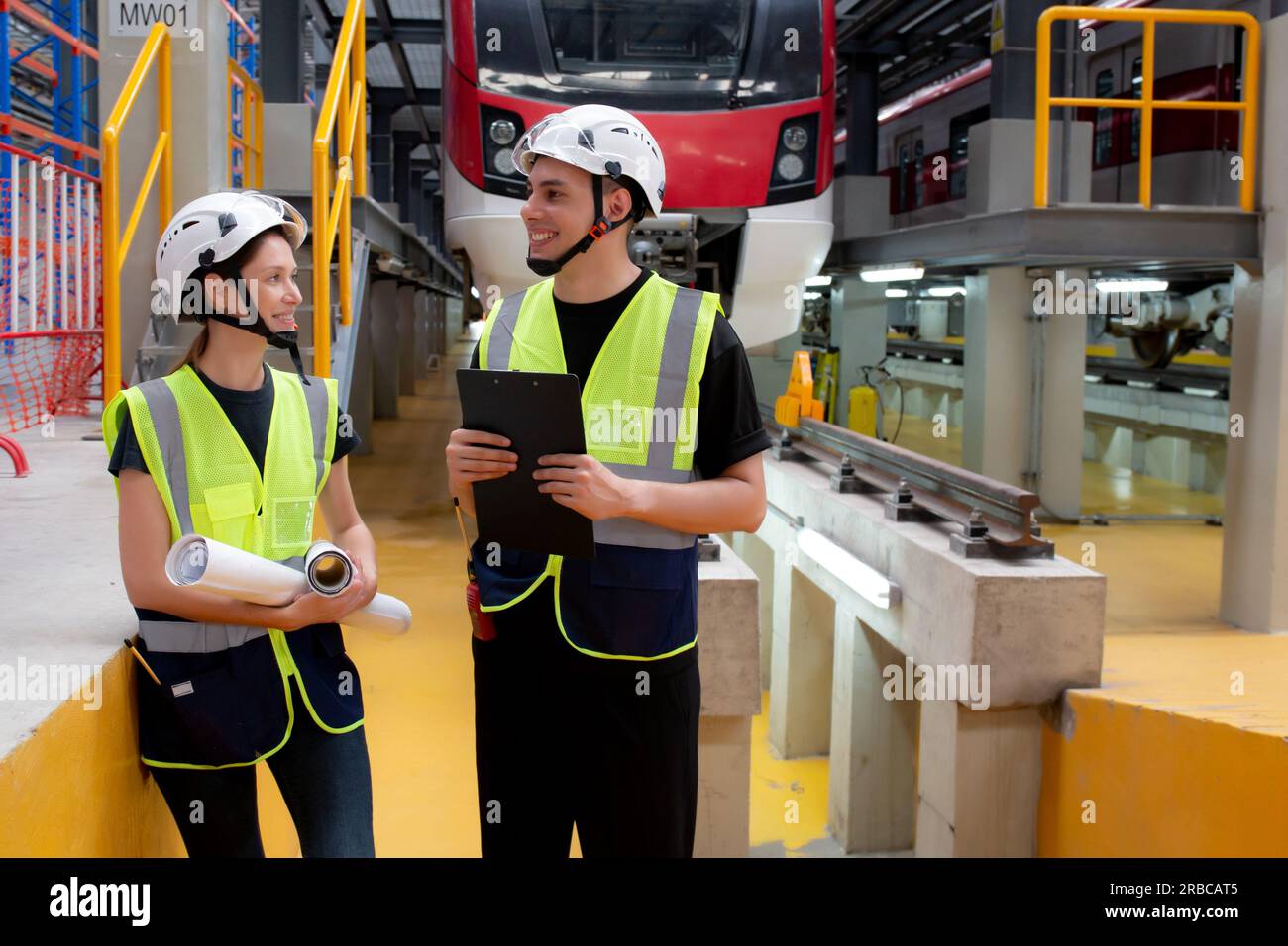 Young caucasian engineer man and woman meeting and checking electric ...