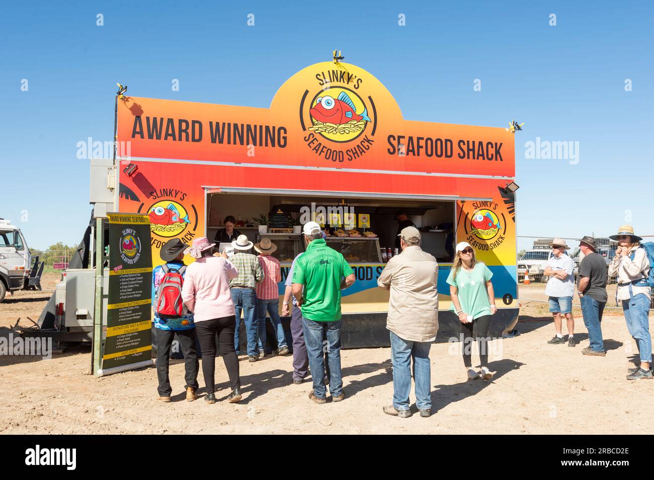 People queueing up at Food Stall Slinky's Seafood Shack at the Bedourie ...