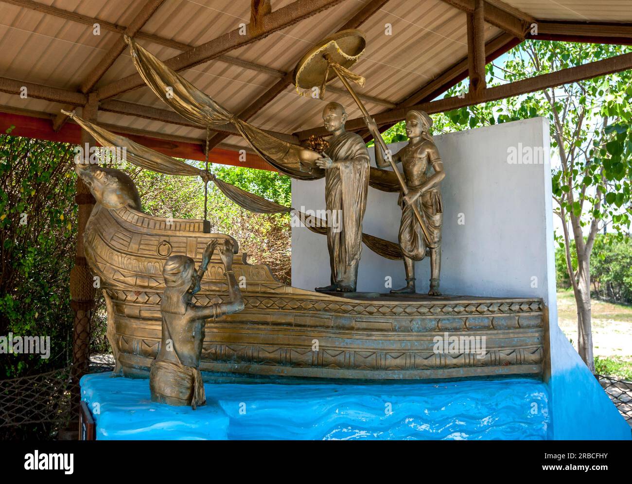 A sculpture depicting Sangamitta Maha Theri arriving by boat from India ...