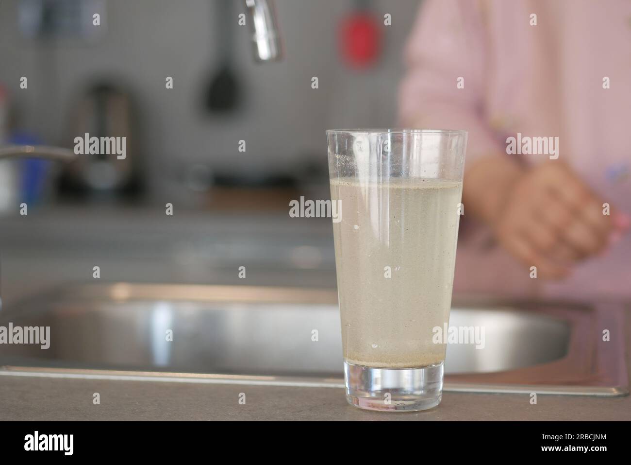 Slow motion pouring water glass hi-res stock photography and images - Alamy