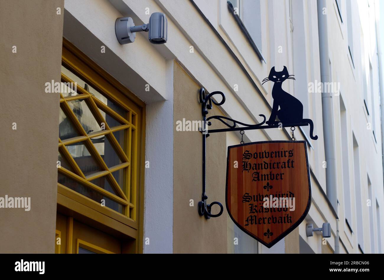 Shop sign in Tallin Stock Photo - Alamy