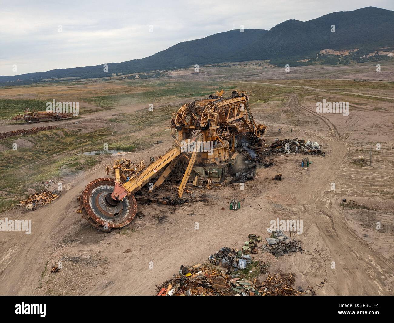 huge bucket wheel excavator being disassembled to scrap metal after ...