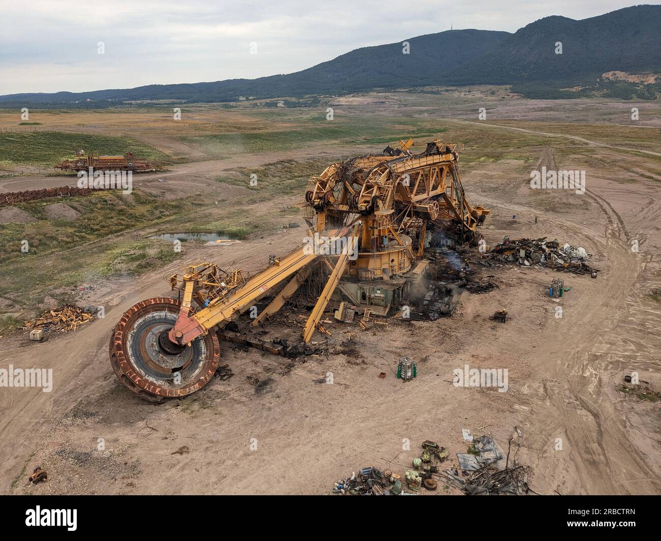 huge bucket wheel excavator being disassembled to scrap metal after ...