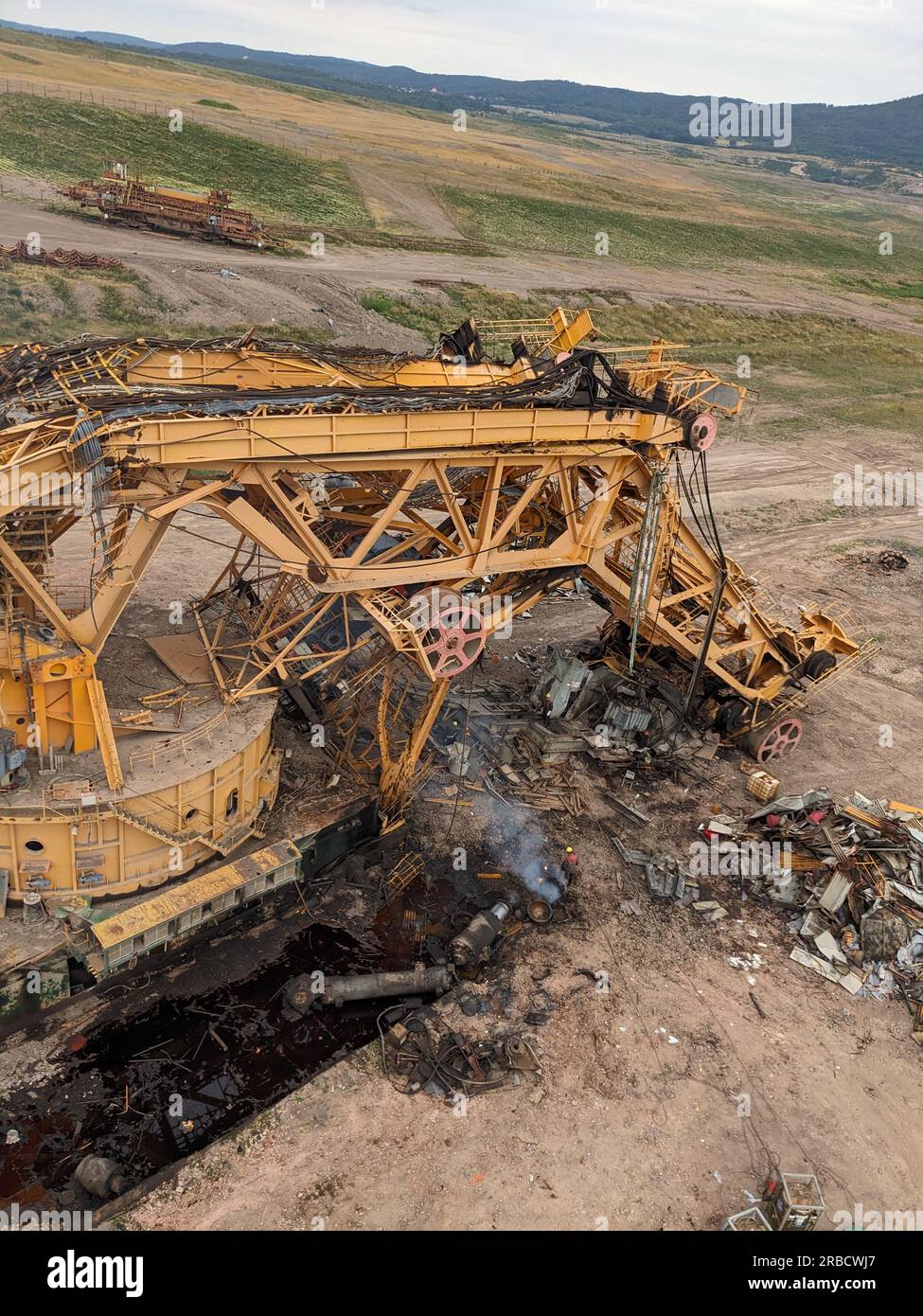 huge bucket wheel excavator being disassembled to scrap metal after ...