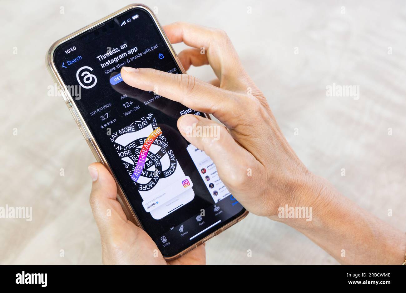 Person preparing to install the new app named Threads by Instagram from ...