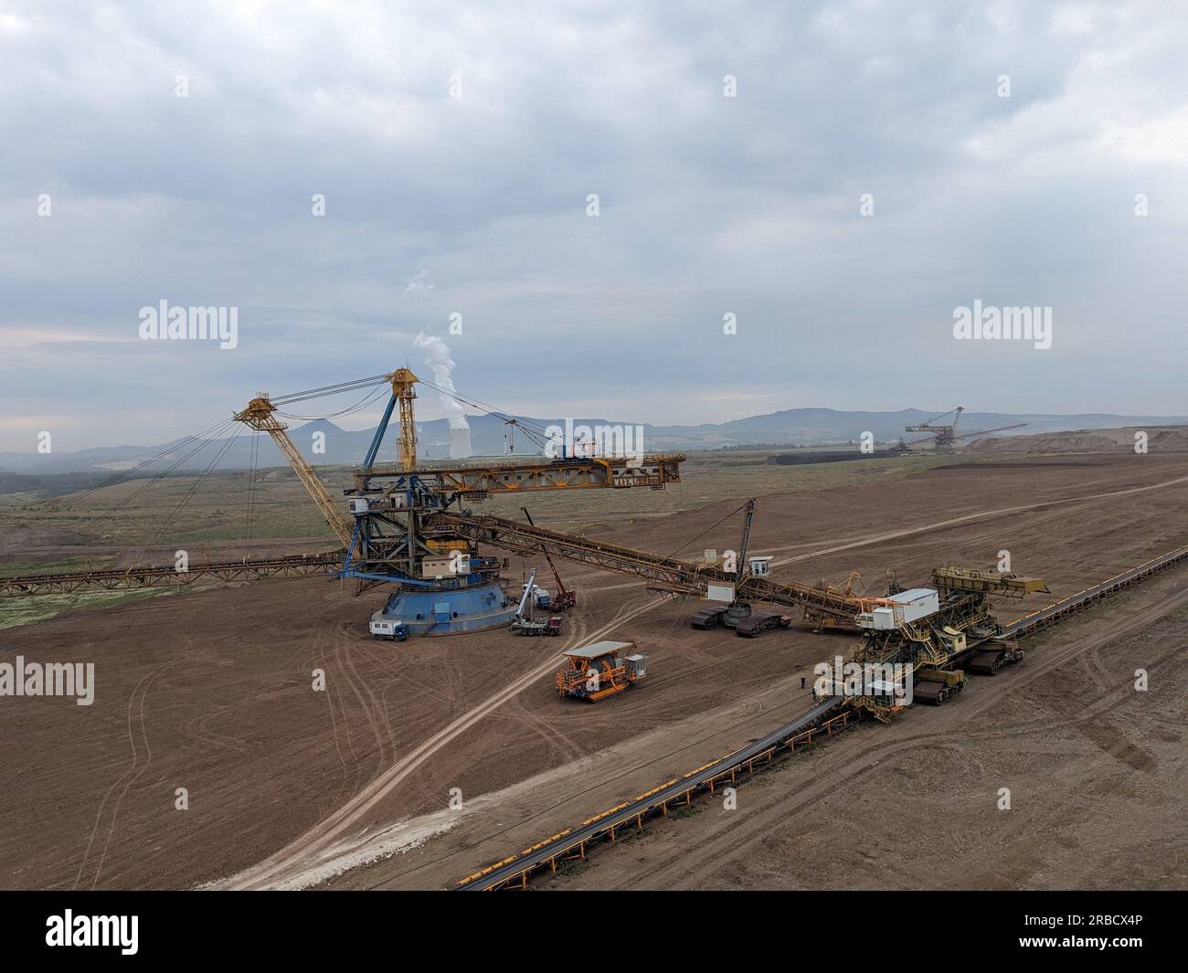 huge bucket wheel excavator digging operations in the brown coal mine ...