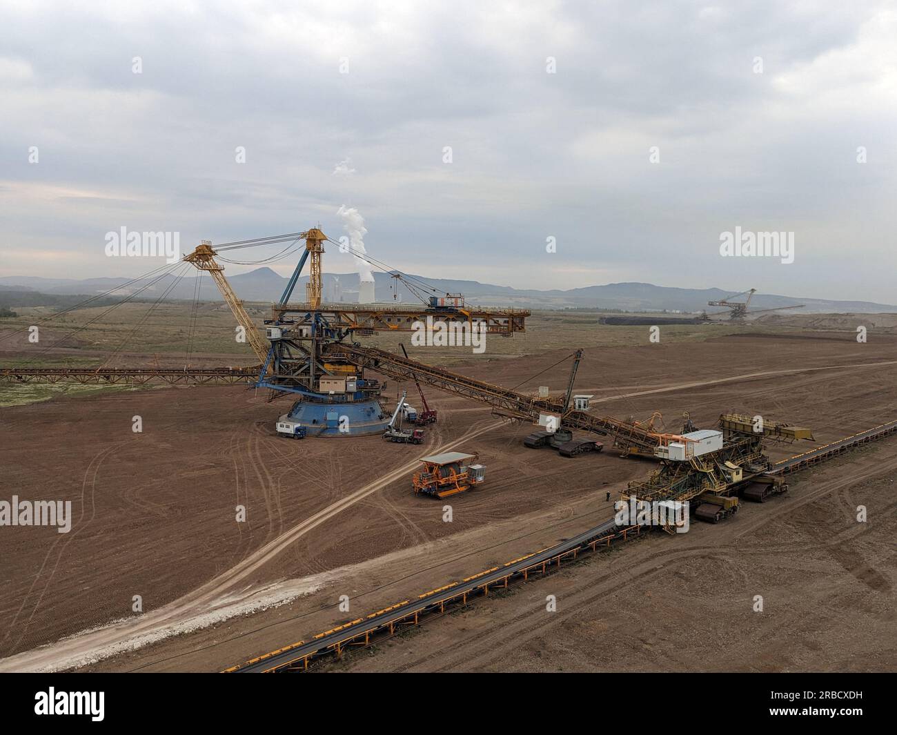 huge bucket wheel excavator digging operations in the brown coal mine ...