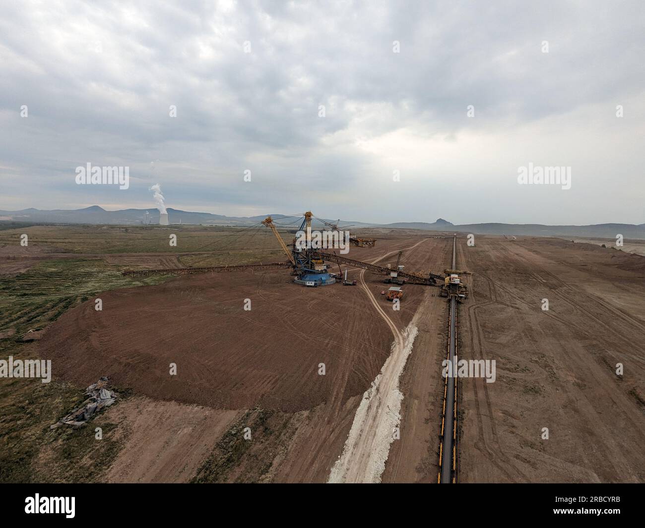 huge bucket wheel excavator digging operations in the brown coal mine ...