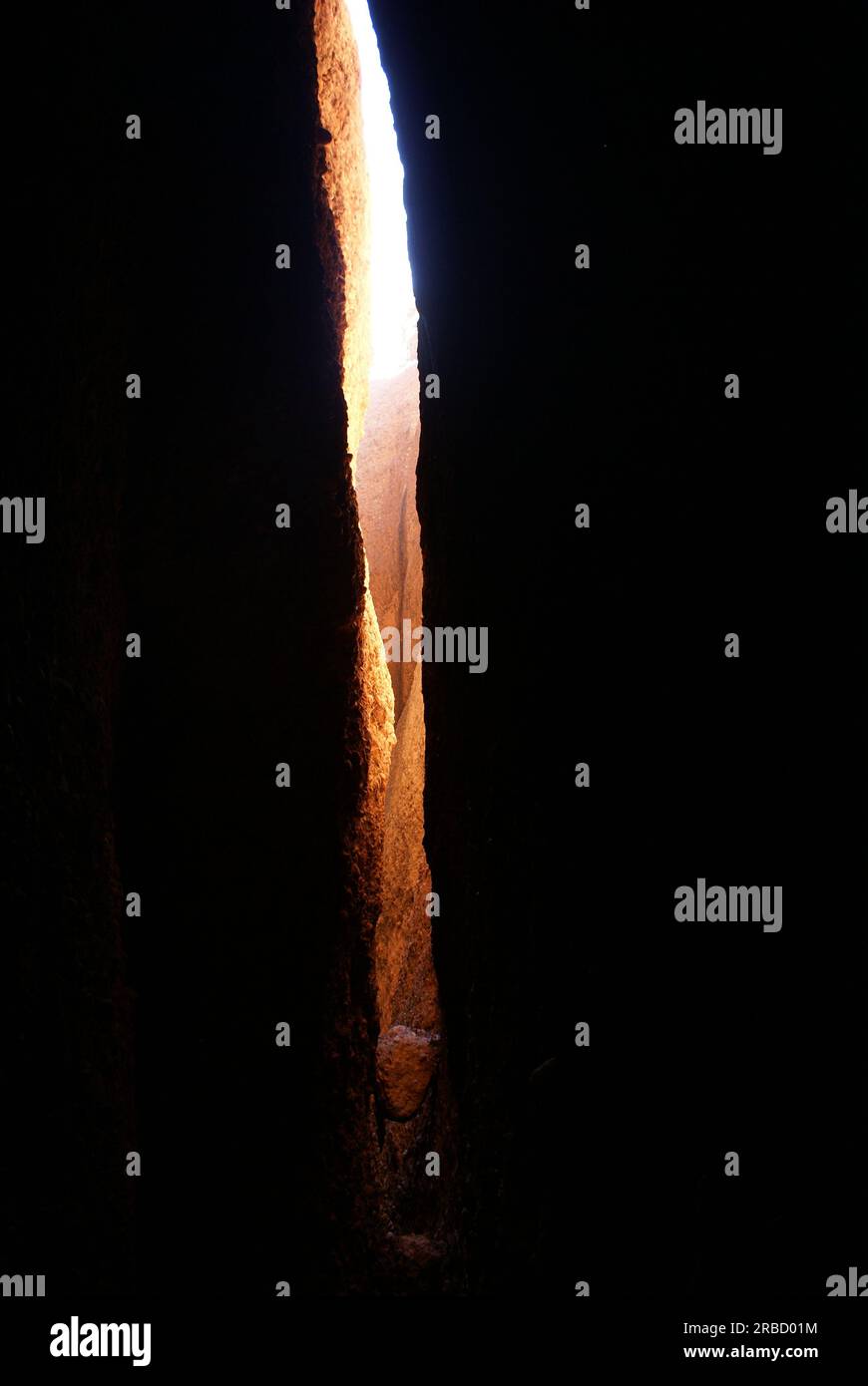 Sunbeam shining into the narrow cleft between the rock walls of Echidna ...
