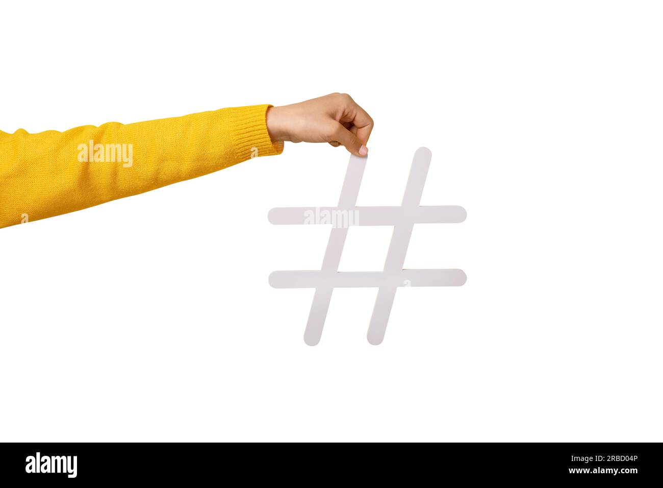 Social media concept, female hand holding big white hashtag sign ...