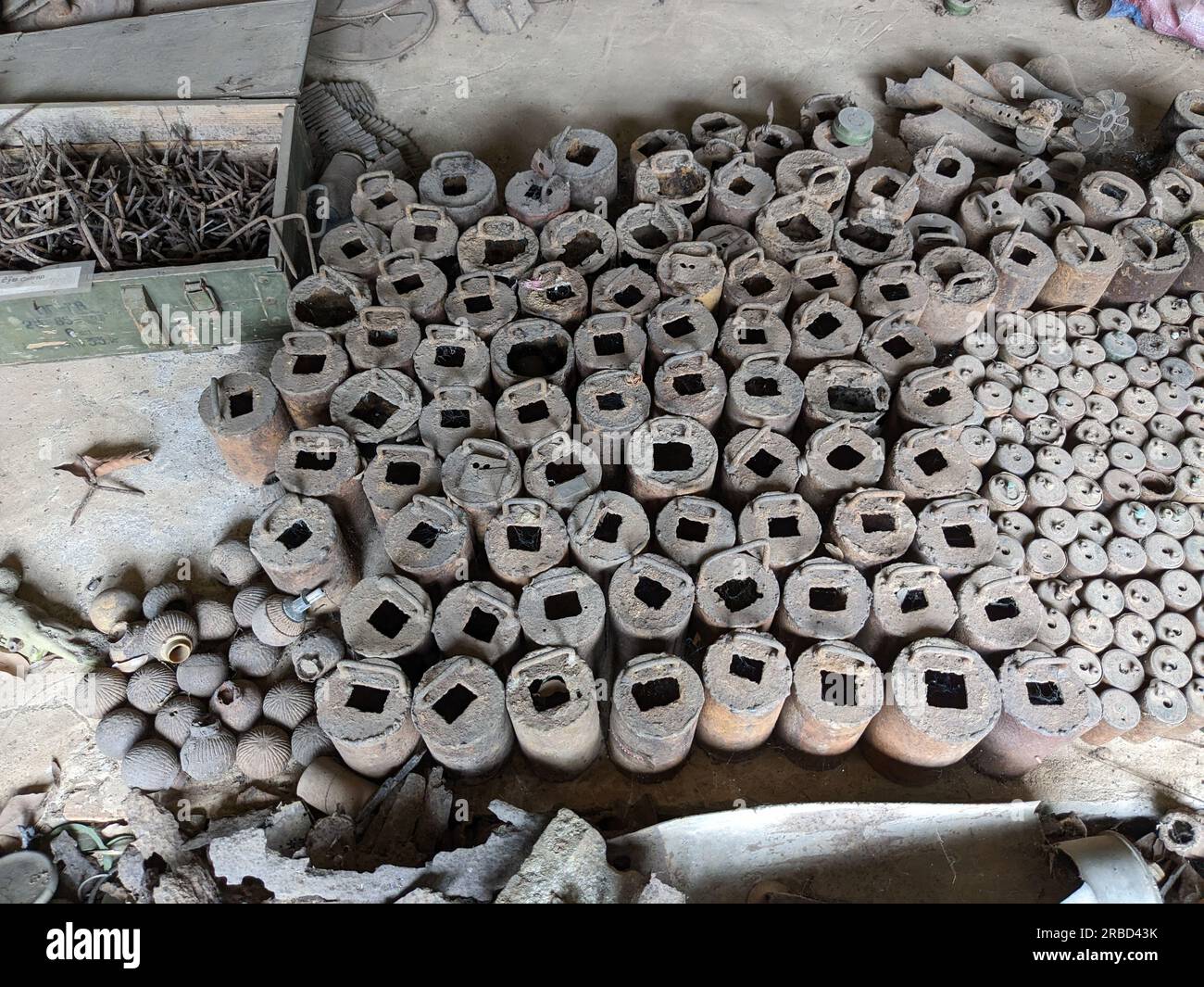 unexploded land mines and cluster bombs remains picked up all around ...