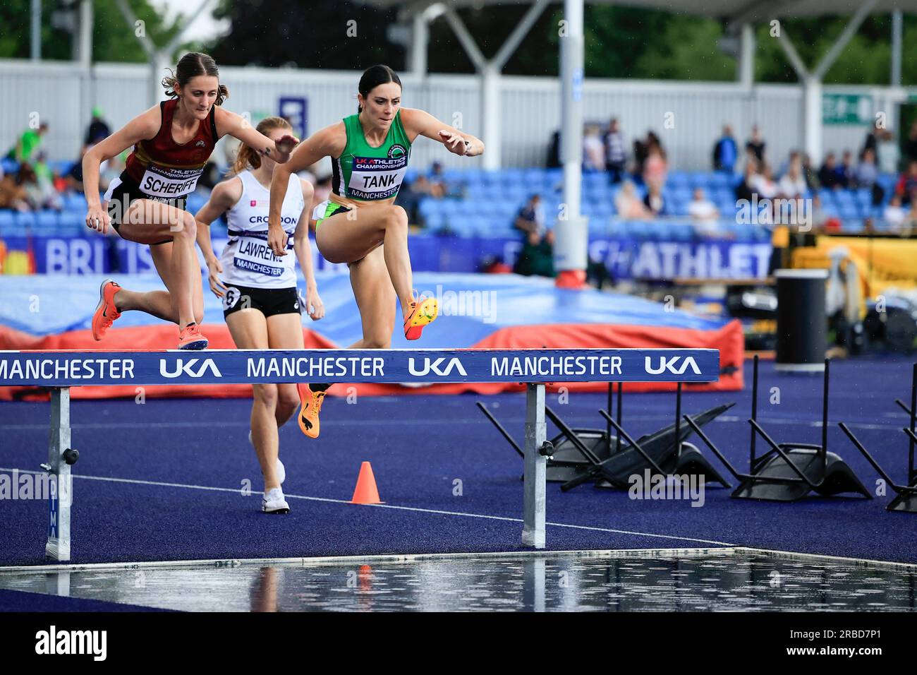Poppy Tank leads the 3000m steeplechase during the UK Athletics Championships at Manchester ...