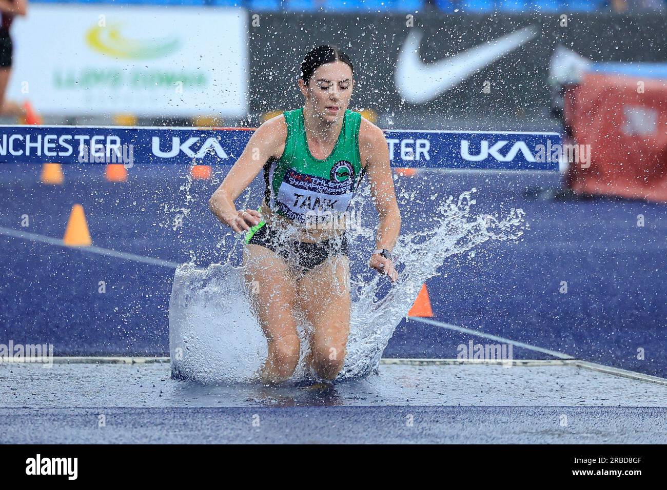 Poppy Tank leads the 3000m steeplechase during the UK Athletics ...