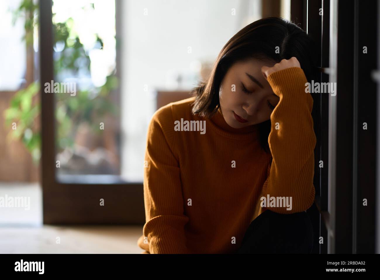 Depressed asian hi-res stock photography and images - Alamy
