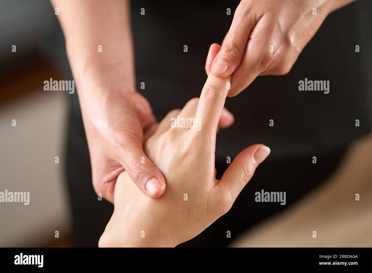 Woman receiving hand massage at beauty salon Stock Photo - Alamy