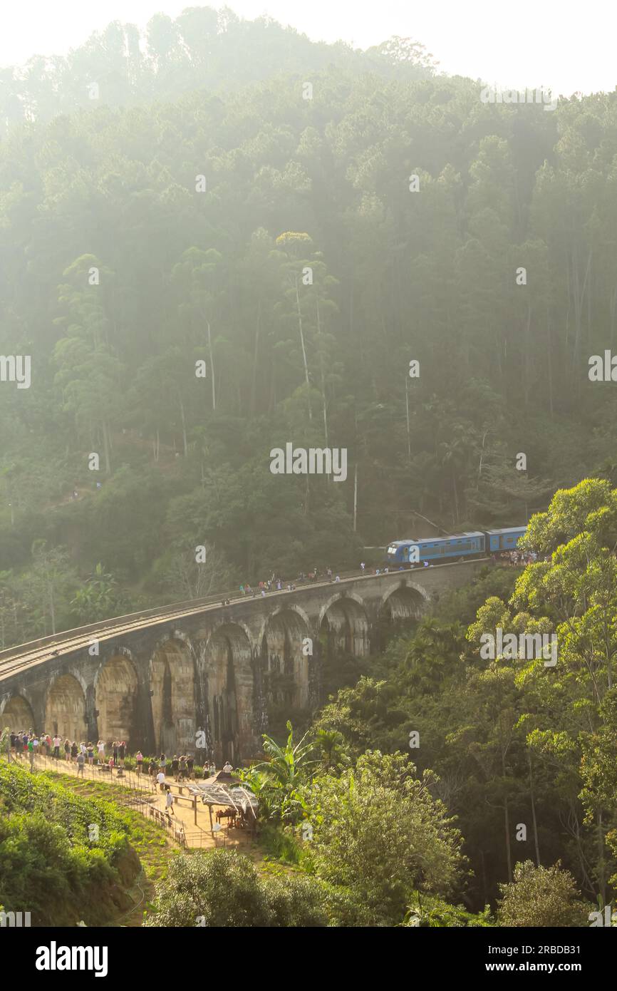 Train crosses Demodara nine arch bridge. Sri Lanka. Aerial vertical ...