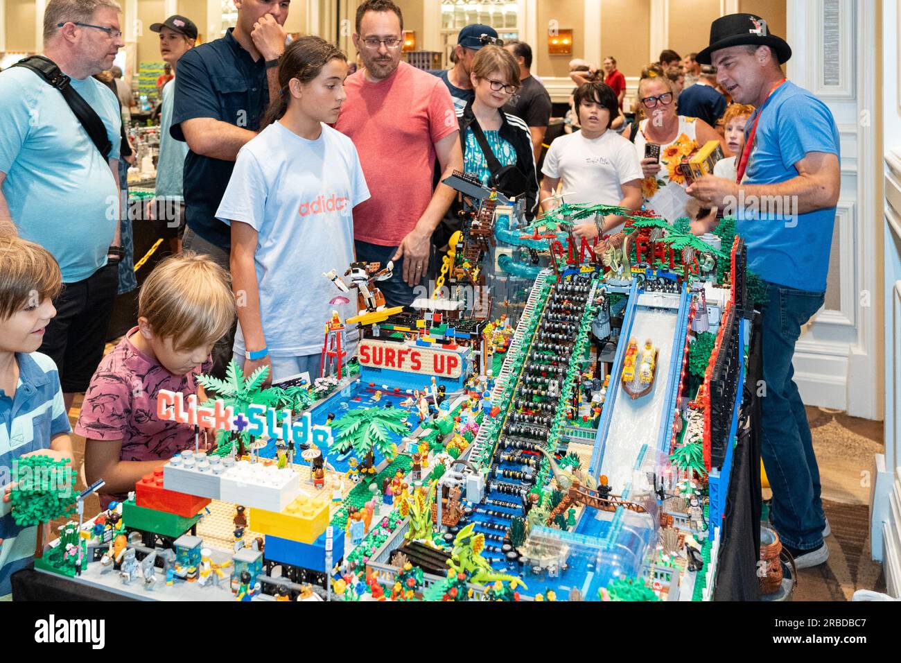 Houston, USA. 8th July, 2023. People look at a water park model built ...