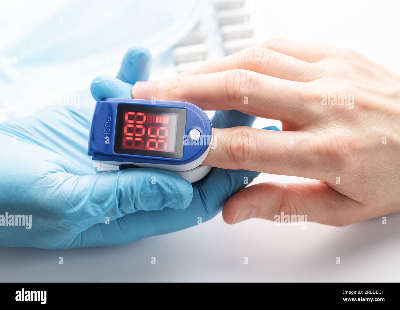 Pulse oximeter measuring oxygen saturation in blood and heart rate ...