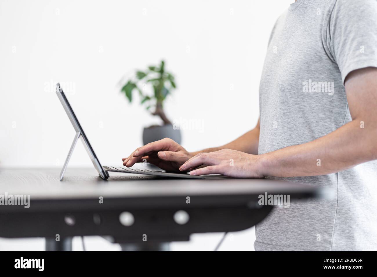 Man working standing coworking space hi-res stock photography and ...