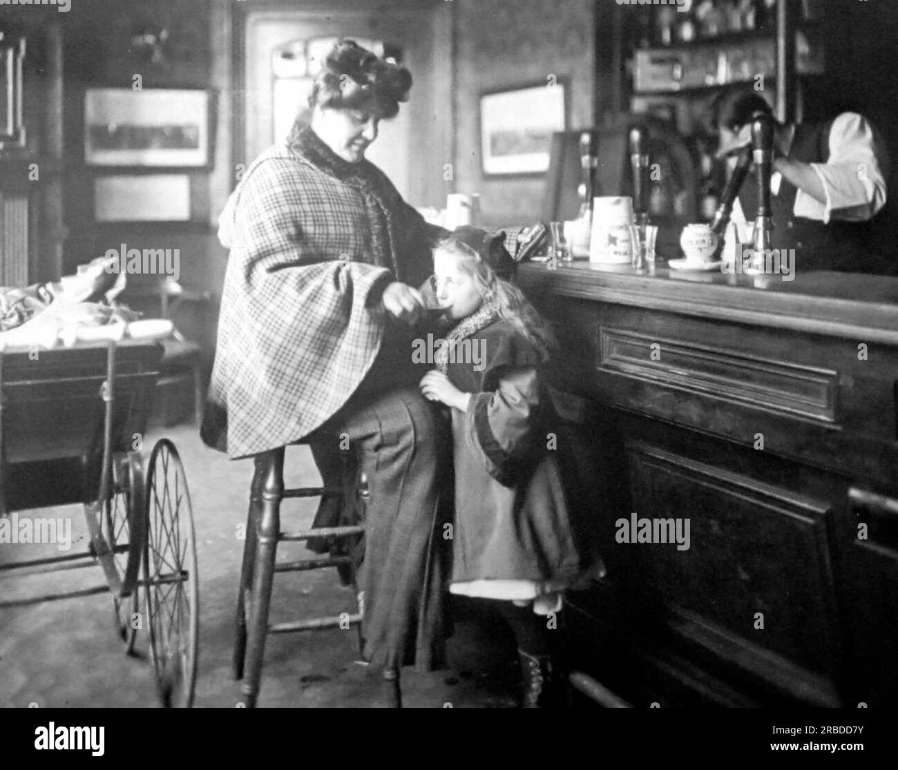 Mother giving her child beer in a pub, Victorian period Stock Photo - Alamy Mother giving her child beer in a pub, Victorian period Stock Photo - Alamy