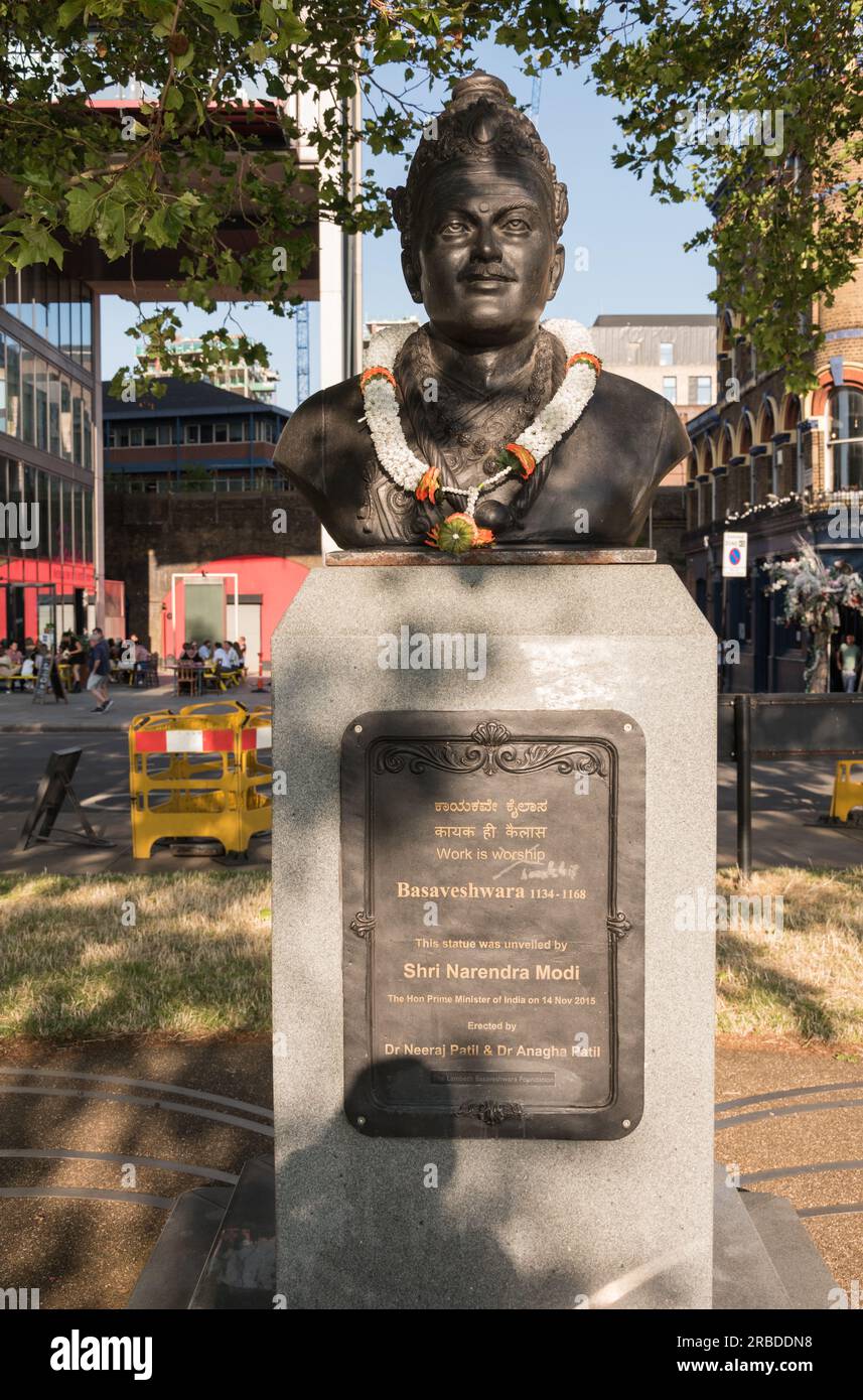 Garlanded statue of 12th Century Indian philosopher Basaveshwara on the ...