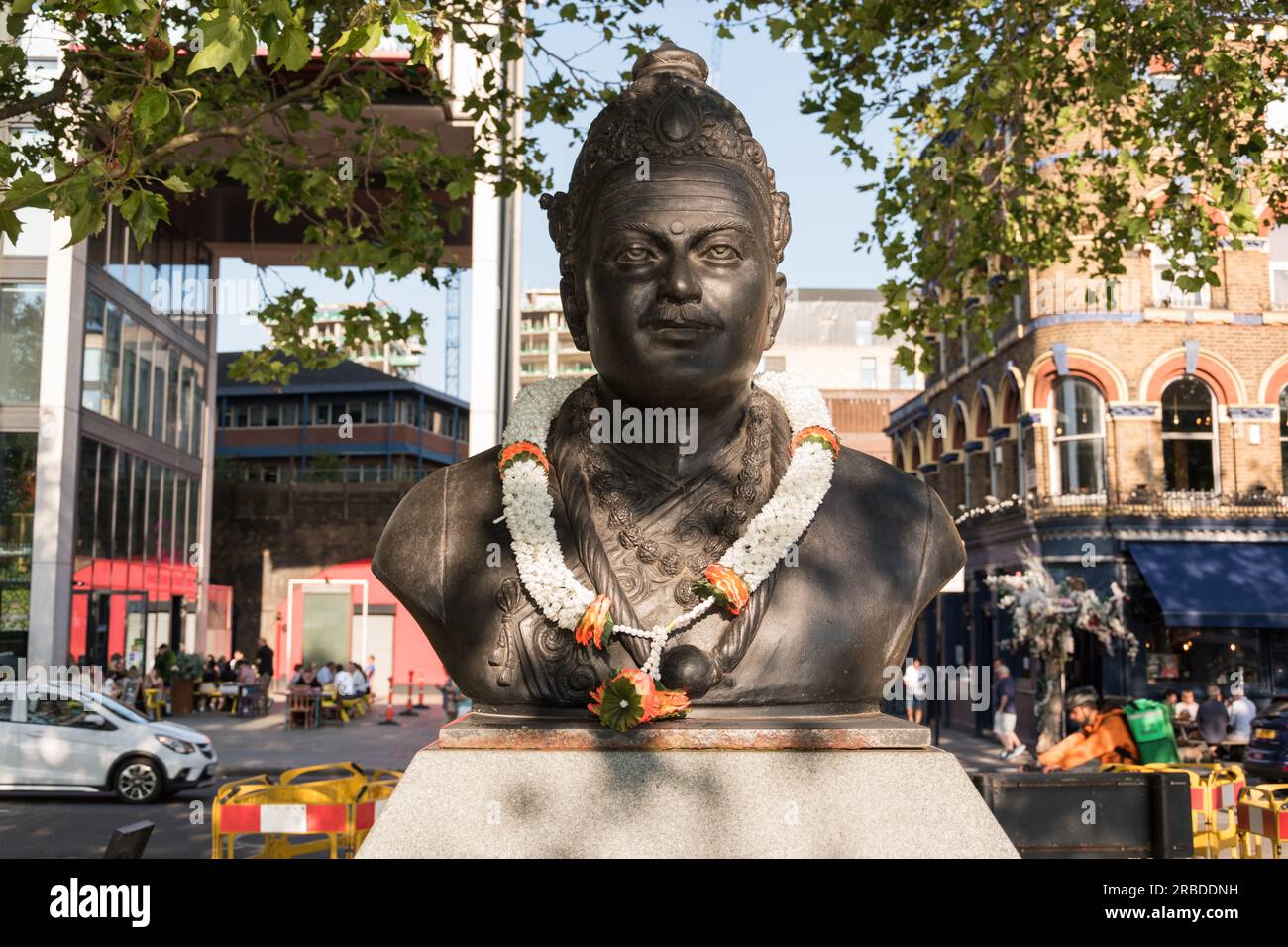 Garlanded statue of 12th Century Indian philosopher Basaveshwara on the ...