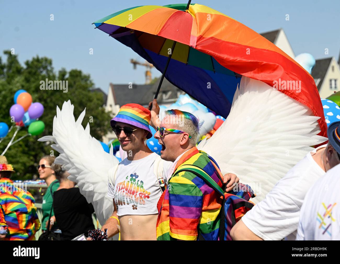 Cologne, Germany. 09th July, 2023. Colorfully dressed participants ...