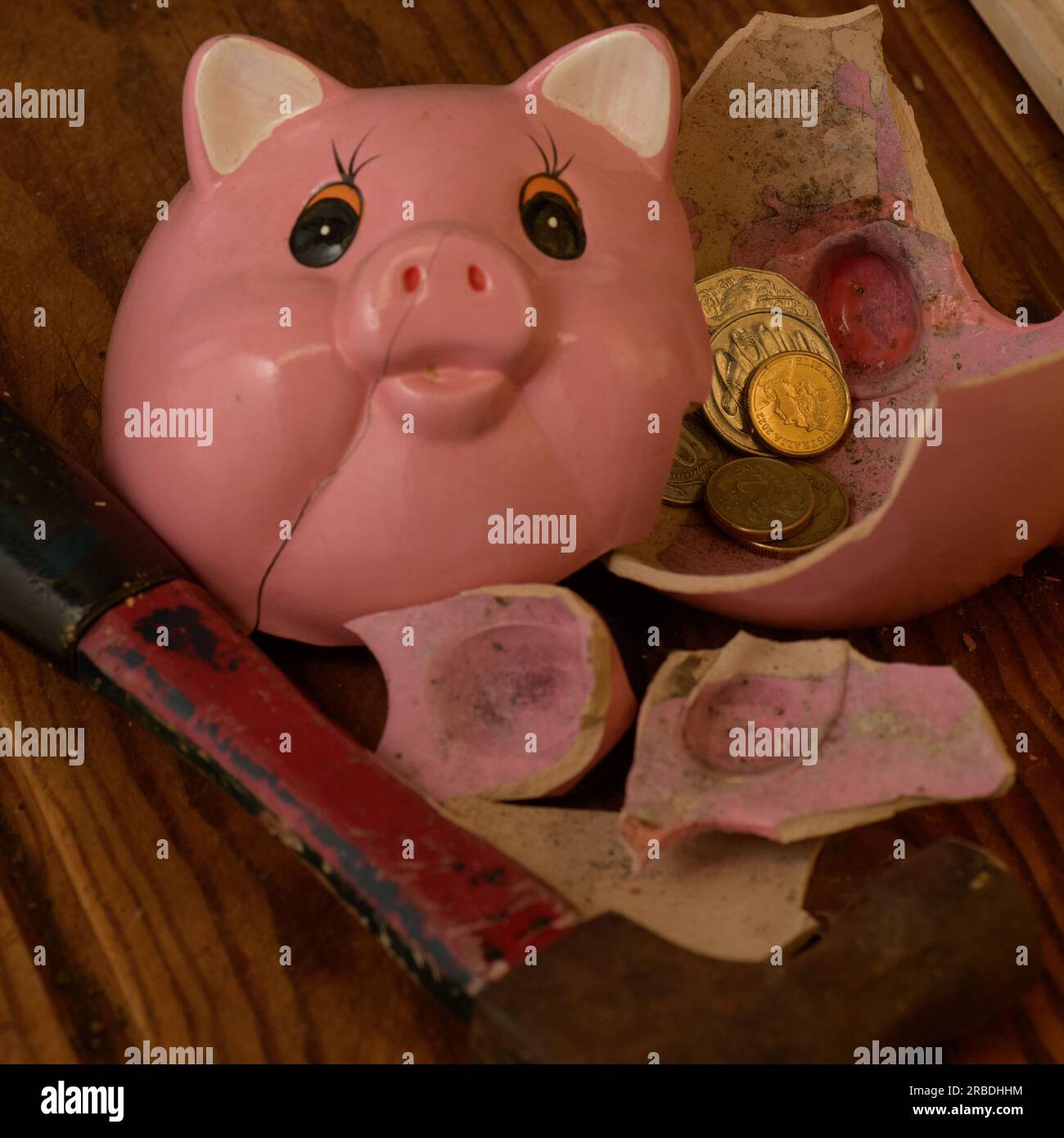 Smashed money piggy bank coins hi-res stock photography and images - Alamy