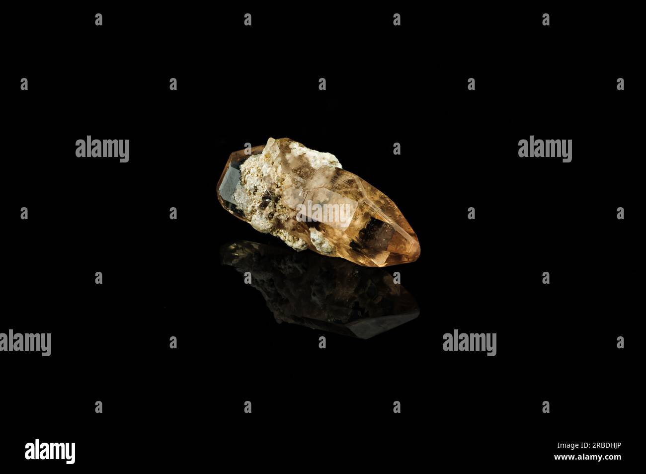 imperial topaz isolated on black background. macro detail close-up ...