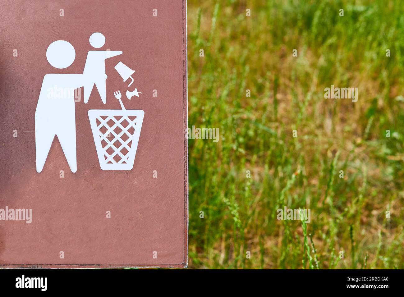 A poster calling for teaching children to throw garbage in designated ...