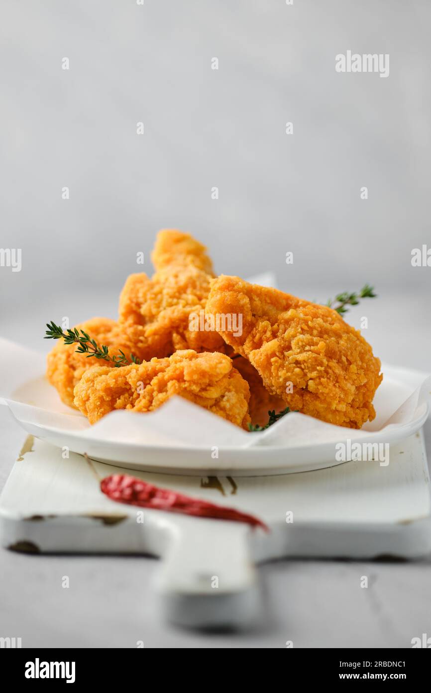 Classic fast food - deep fried spicy chicken meat closeup Stock Photo ...
