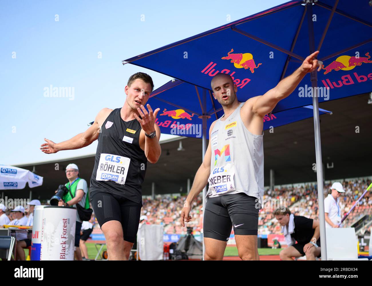 left to right Thomas ROEHLER (Rohler)(LC Jena), winner Julian WEBER ...