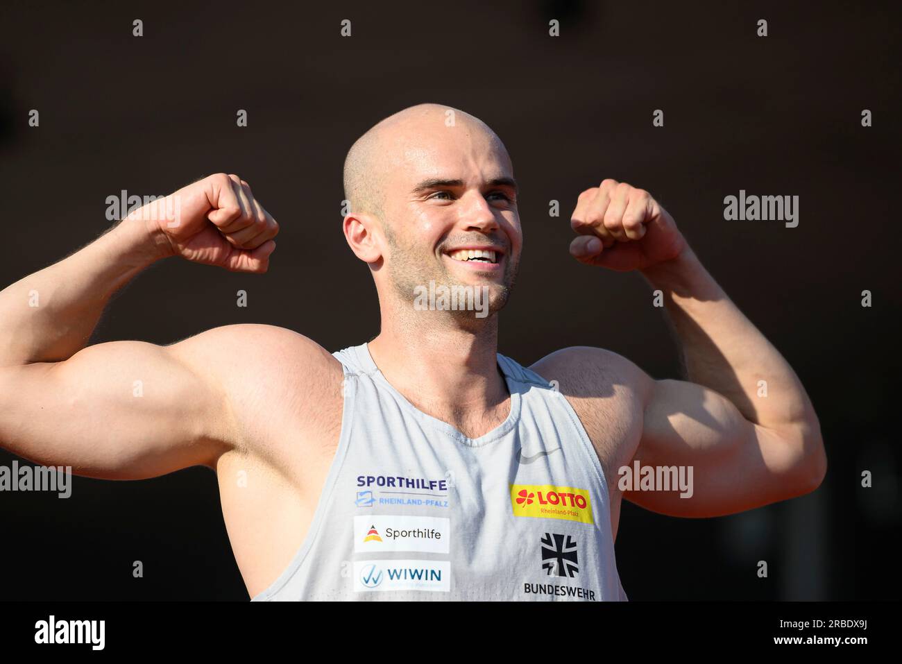 Jubilation winner Julian WEBER (USC Mainz) shows his muscles, men's ...