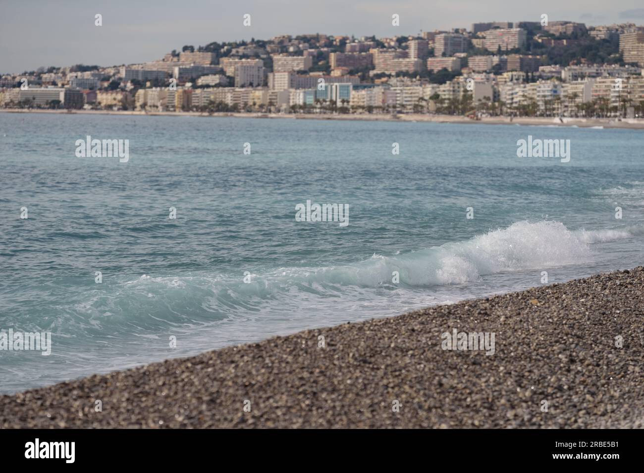 Morning waves on pebble beach in Nice, France, travel content Stock ...