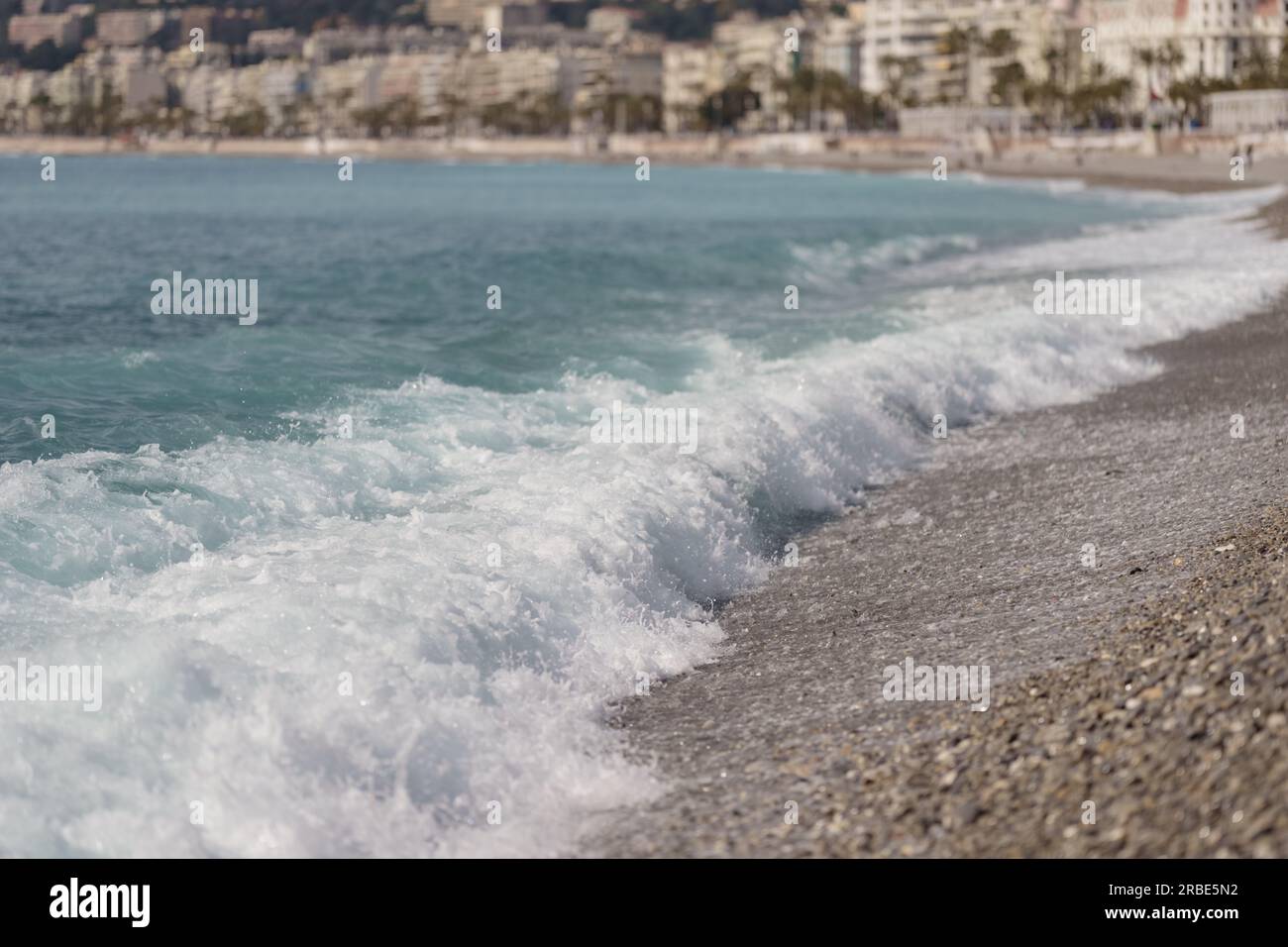 Morning waves on pebble beach in Nice, France, travel content Stock ...