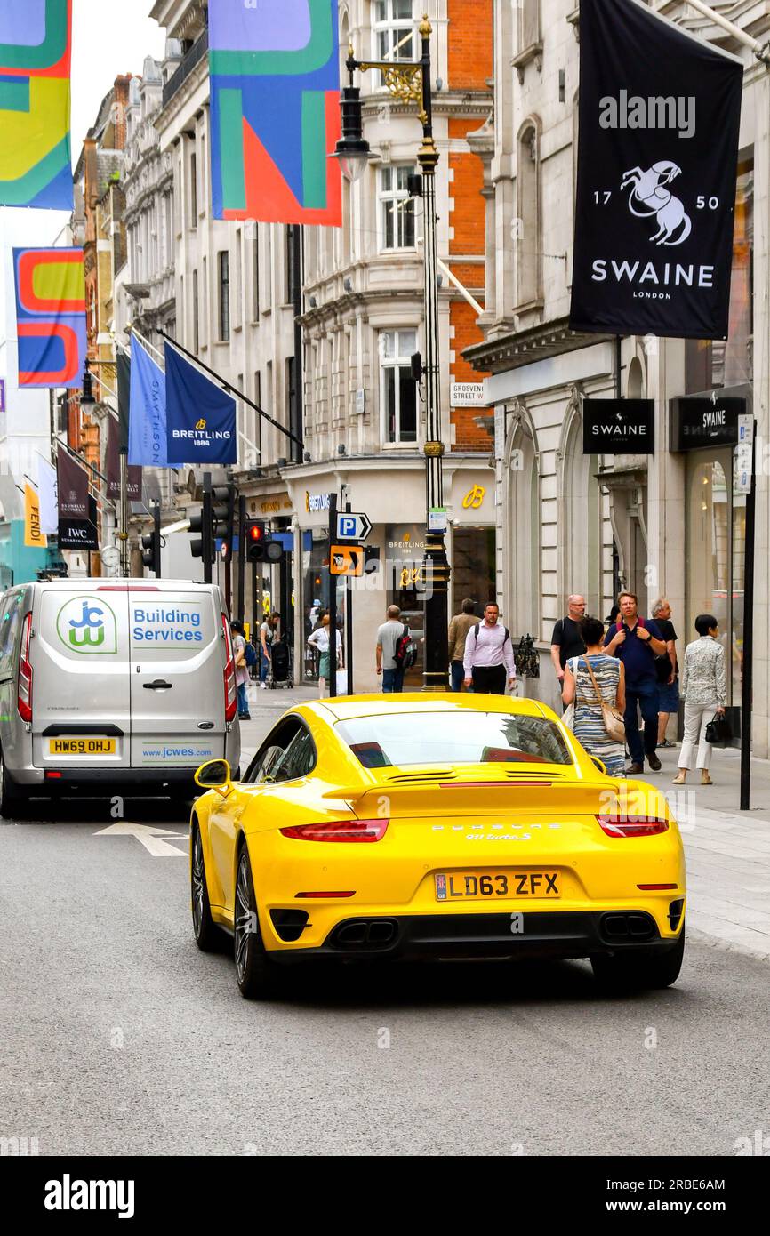 London, England, UK - 27 June 2023: Rear view of a yellow Porsche ...
