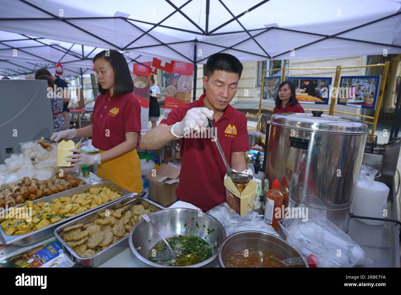 Asian cooks cooking meals at the kitchen of the asian street food ...