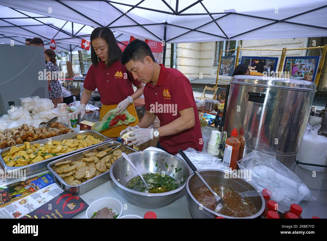 Asian cooks cooking meals at the kitchen of the asian street food ...