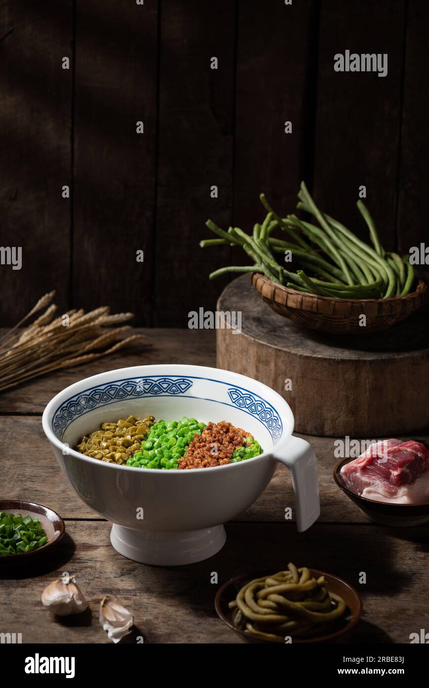 Zhajiangmian, (Chinese dish of ground pork over wheat noodles) Isolated ...