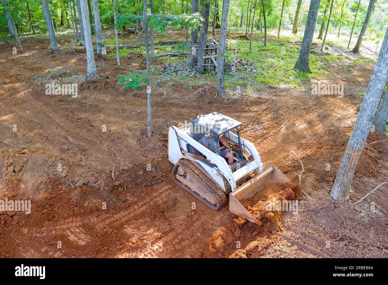 Use of tractor in construction enablese movement heavy earth materials ...