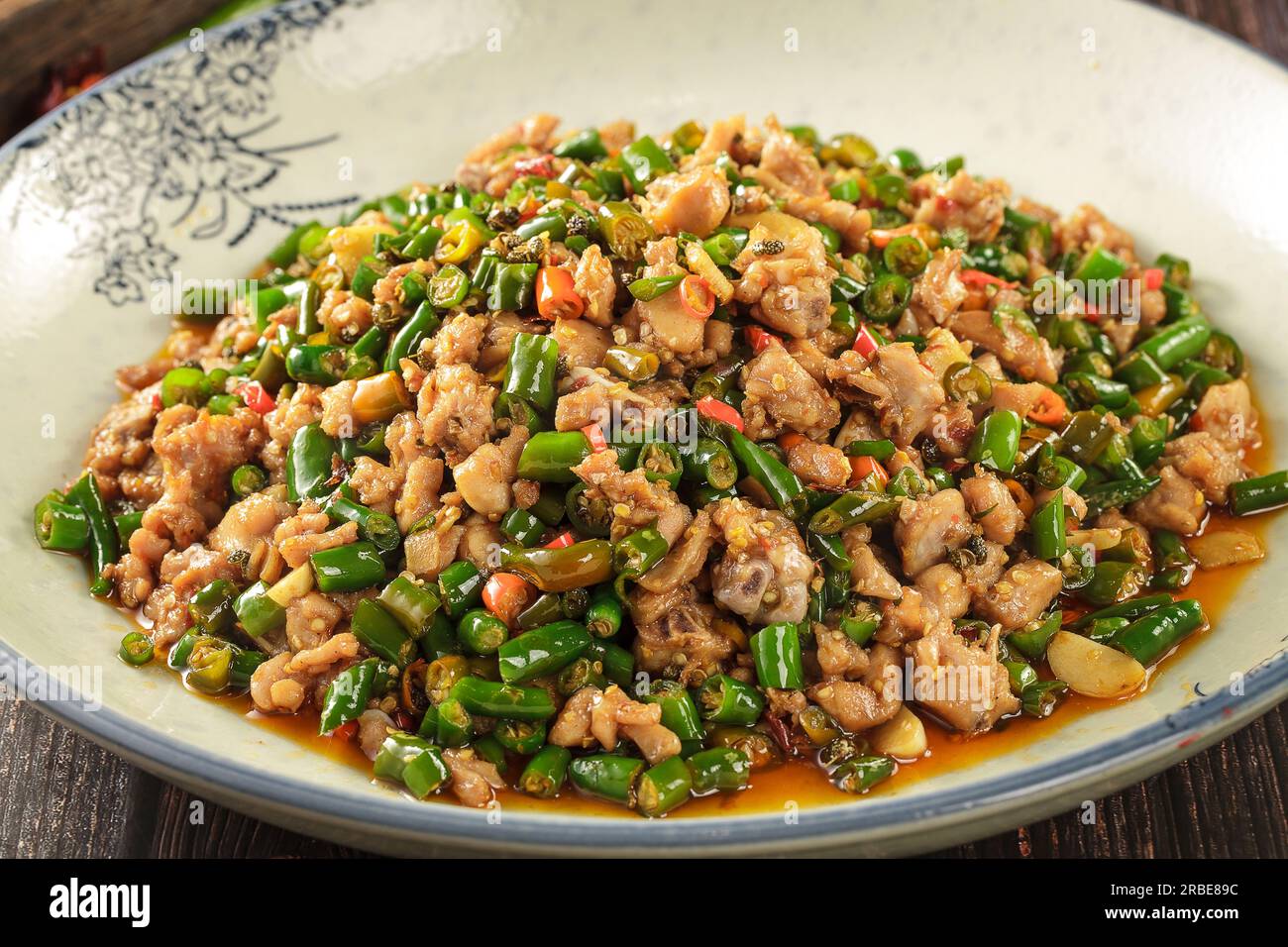 stir fried Chicken and Mushrooms in Chili Sauce Stock Photo - Alamy