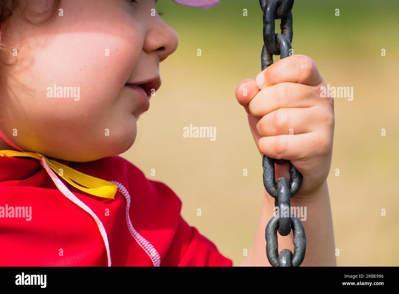 Happy family playing swinging children hi-res stock photography and ...