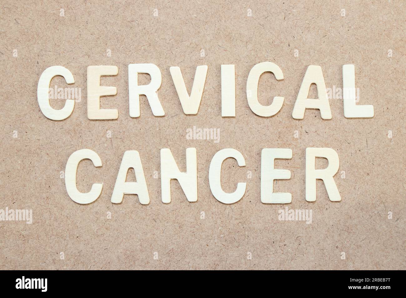 Wood alphabet letter in word cervical cancer on wood background Stock ...