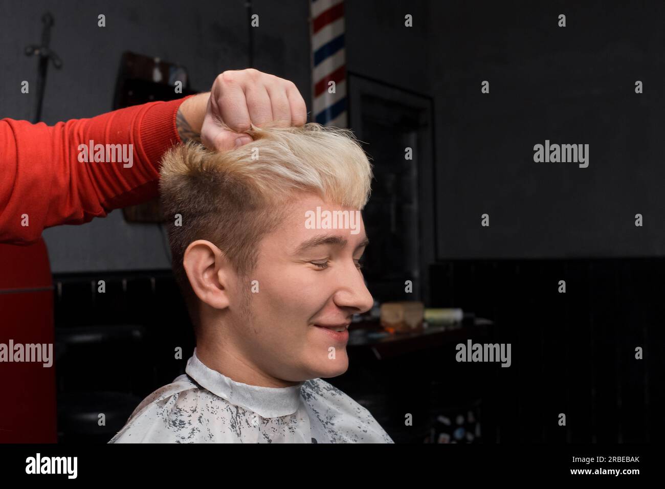 Smiling guy handsome young european appearance with closed eyes ...