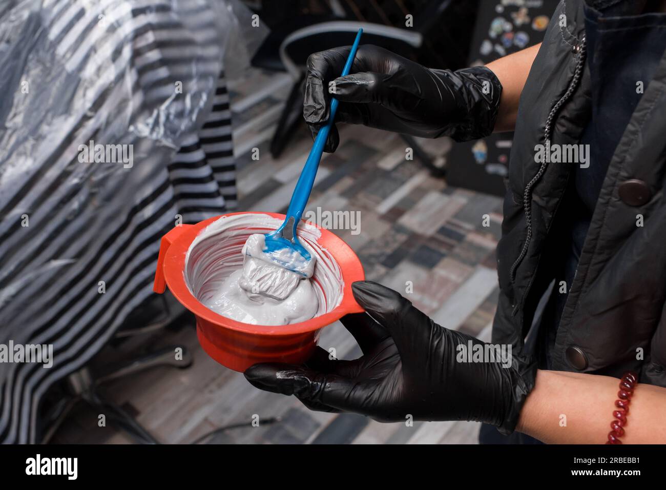 Hair coloring process mixing ingredients brush paint container dye ...