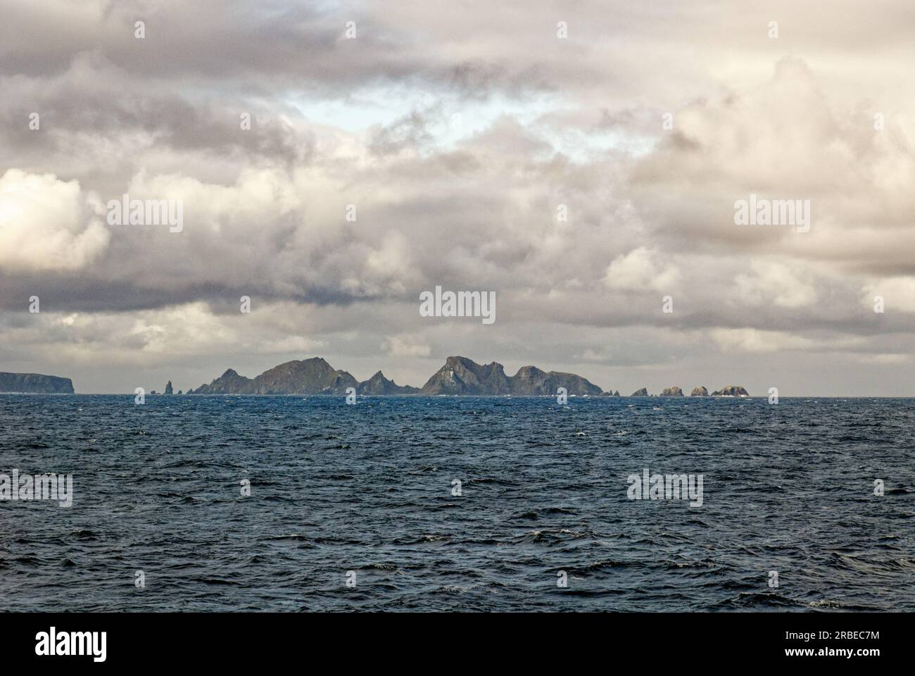 Cruising Cape Horn on rough sea. Cape Horn is rocky point on Hornos ...