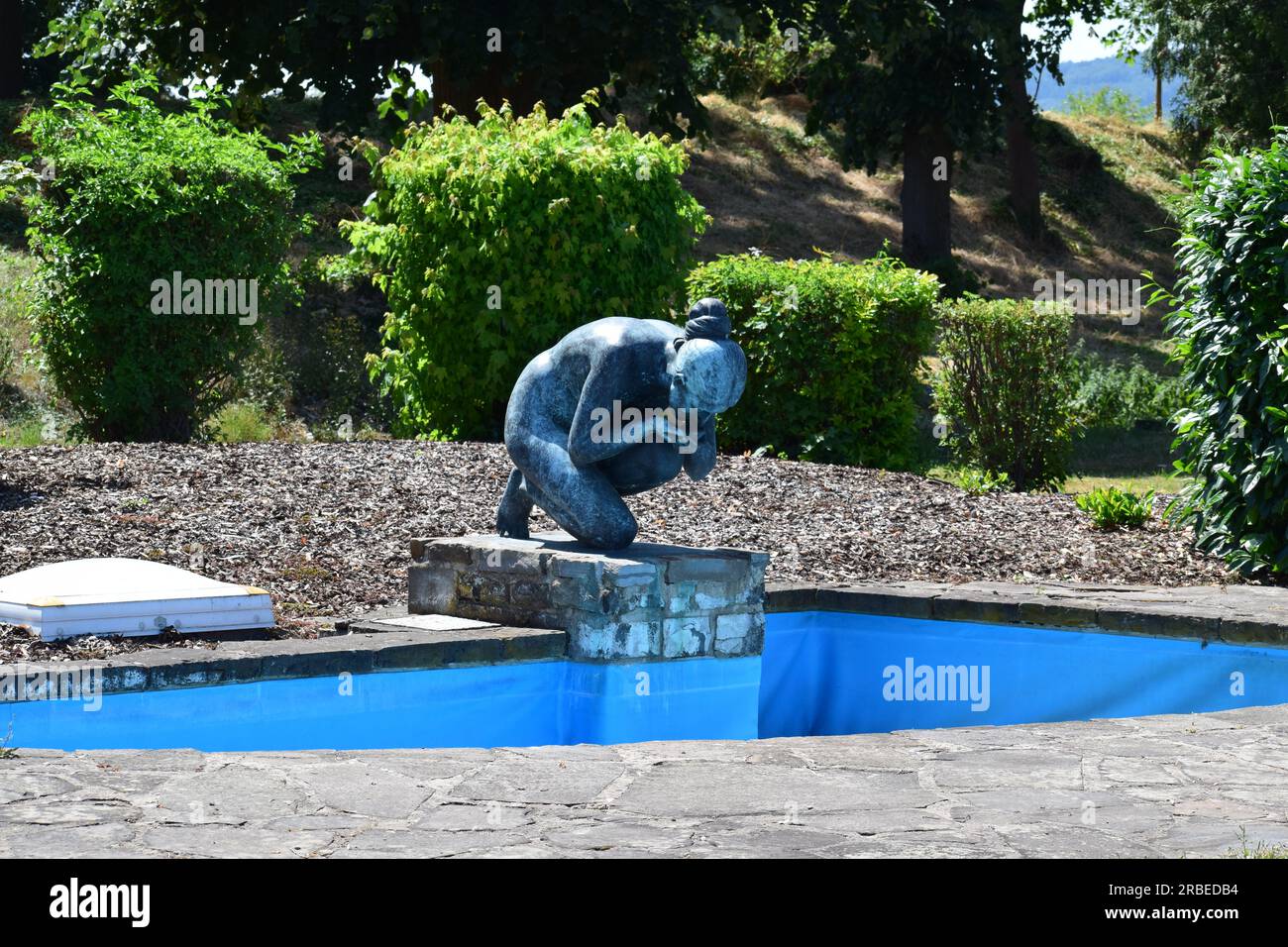 Drinking Girl Statue at Reginarisbrunnen Stock Photo - Alamy