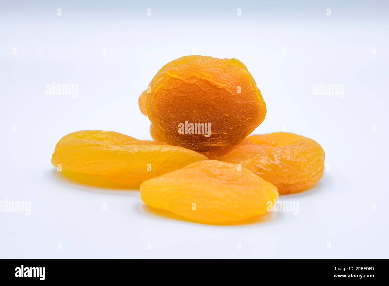 Dry apricot fruit isolated on white background Stock Photo - Alamy