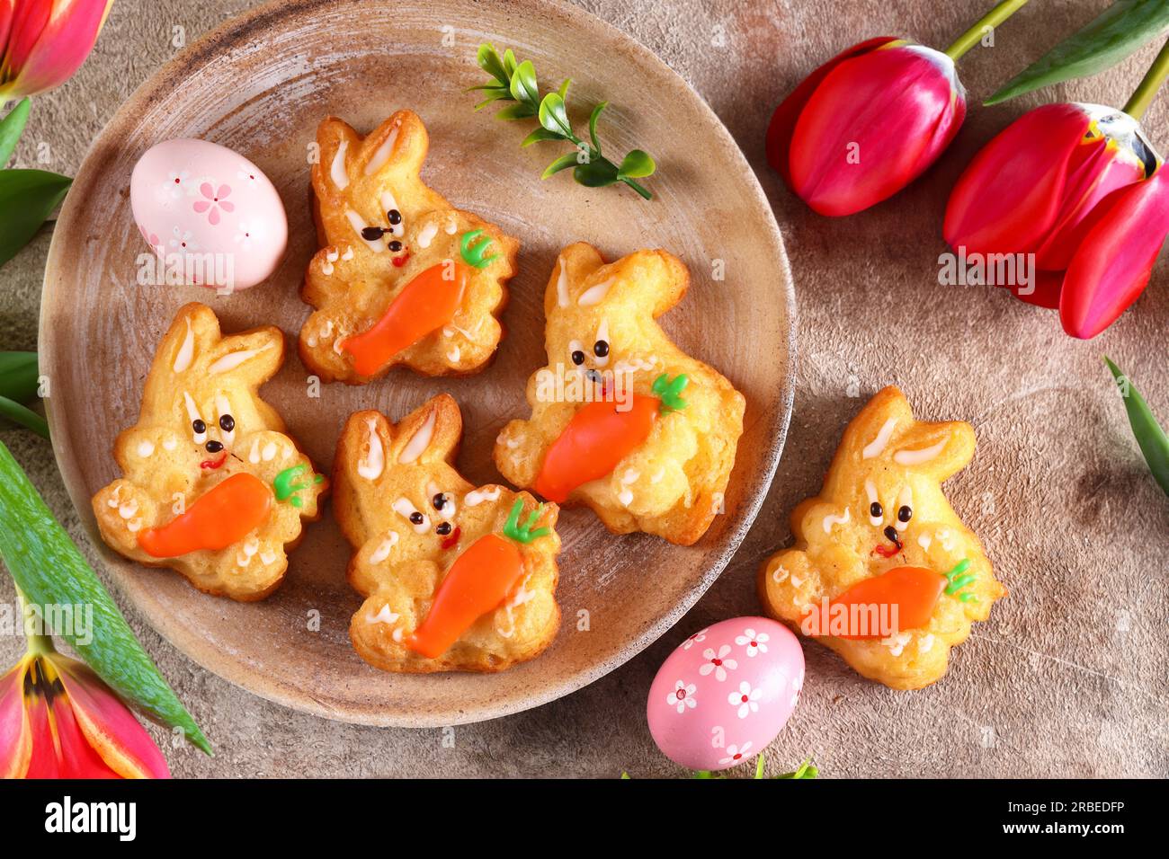 easter buns in the shape of a rabbit on a plate Stock Photo - Alamy