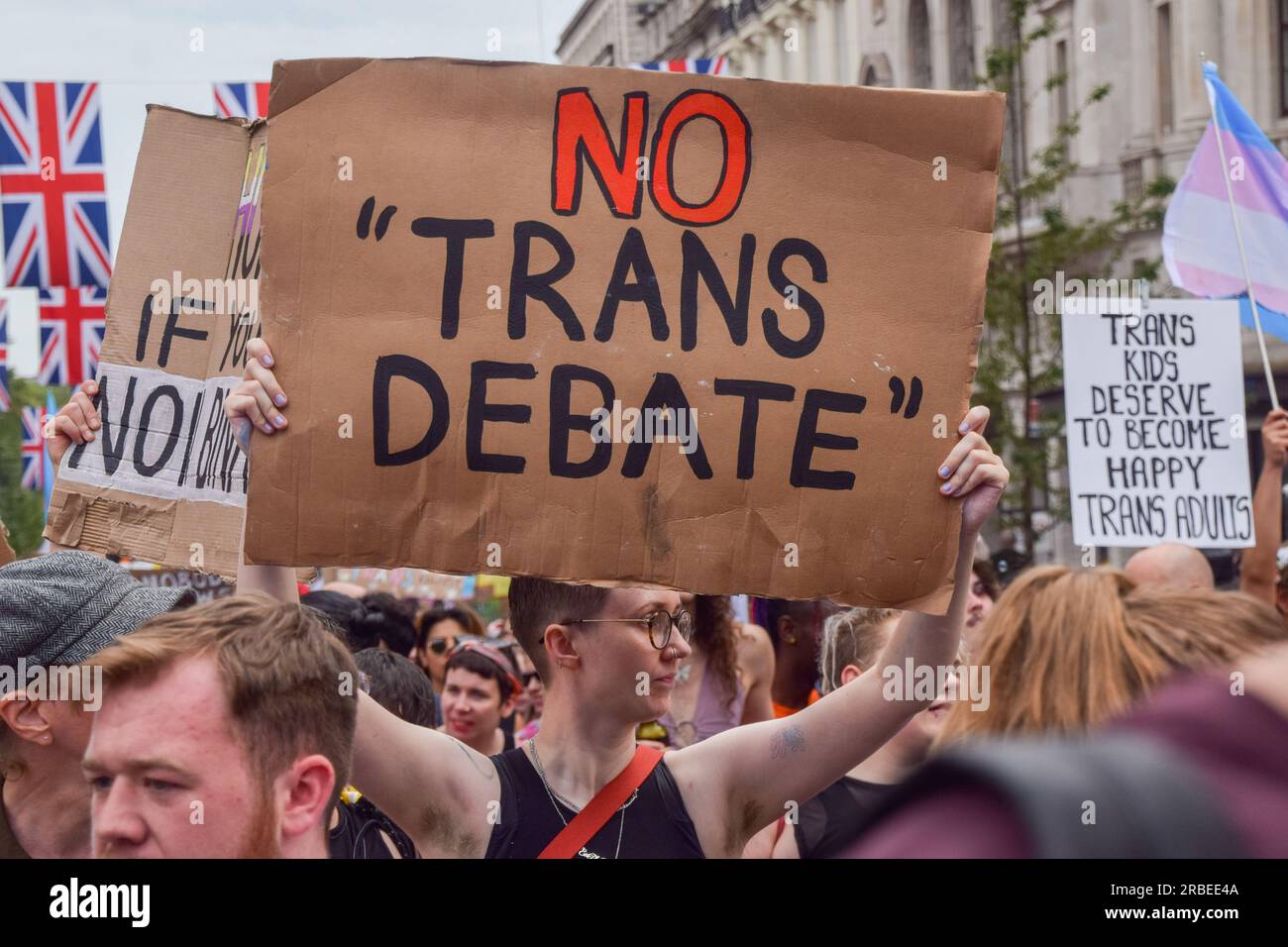 London, UK. 08th July, 2023. A protester holds a 'No trans debate ...